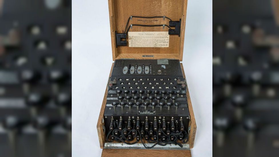 Alan Turing school report in Cambridge codebreaker exhibition - BBC News