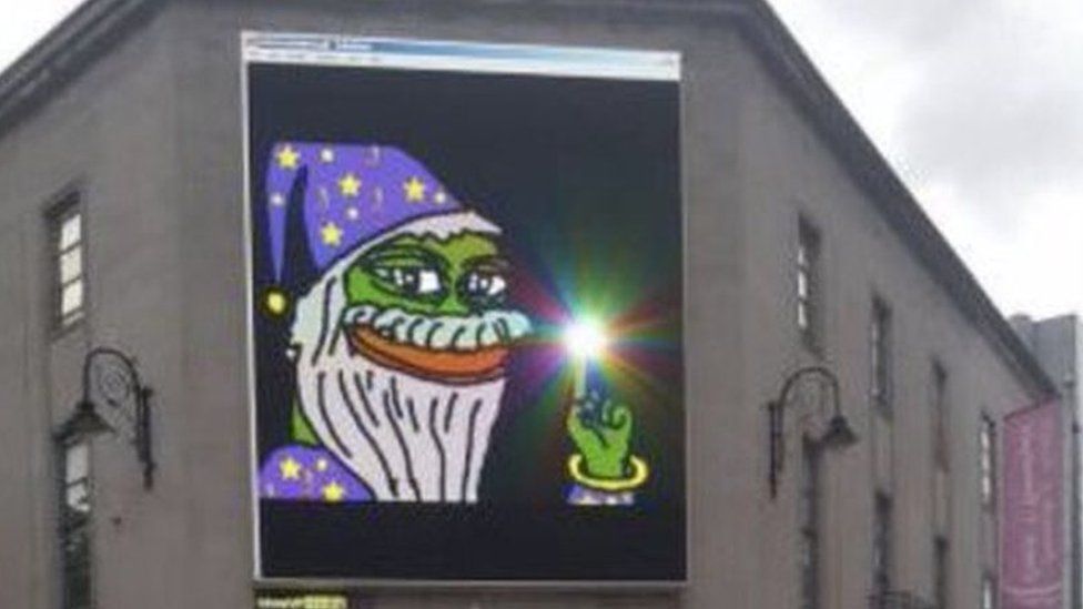 Cardiff billboard offensive images display after hack - BBC News
