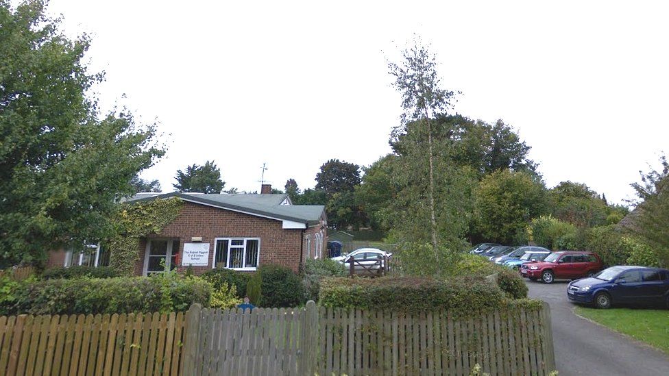 School in Theresa May's constituency seeks £1 for pens - BBC News