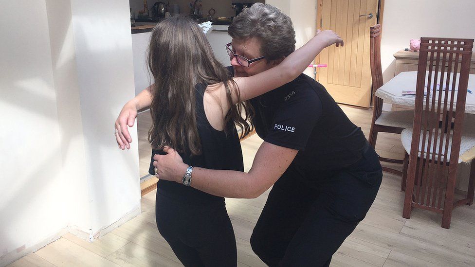 Manchester attack: PC reunited with bomb victim Lily Harrison - BBC News