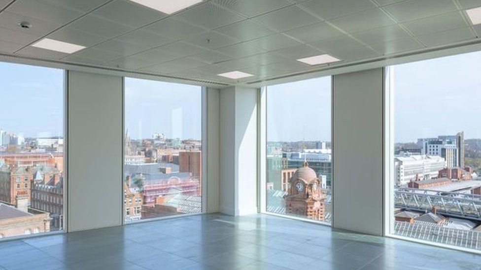 Criticism over government office 'lit up like Christmas tree' - BBC News