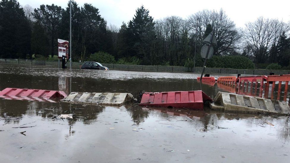 In pictures: Storm Dennis brings flooding to Wales - BBC News