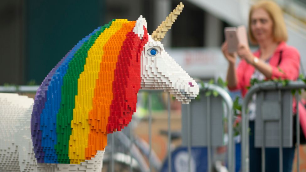 Cardiff Bay Lego show displays fire-breathing 11ft dragon - BBC News