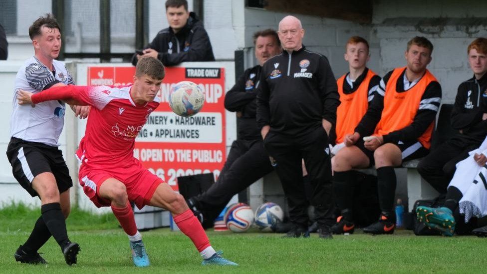 Bacup FC: Veteran football manager marks 25 years at club - BBC News