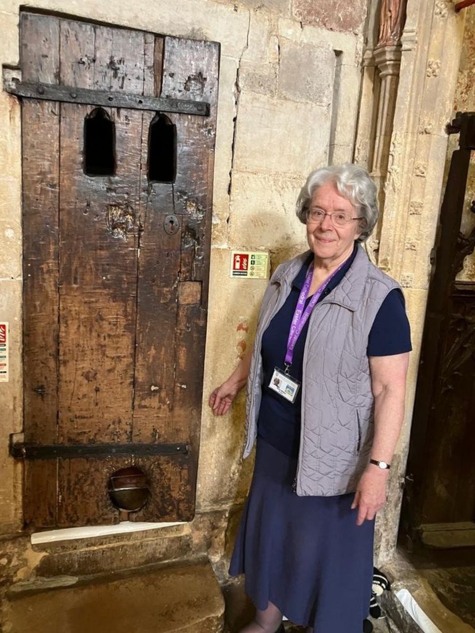 Exeter Cathedral door hole could be world's oldest cat flap - BBC News