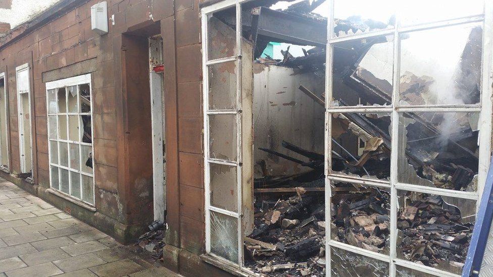Fire guts derelict Lockerbie shop building - BBC News