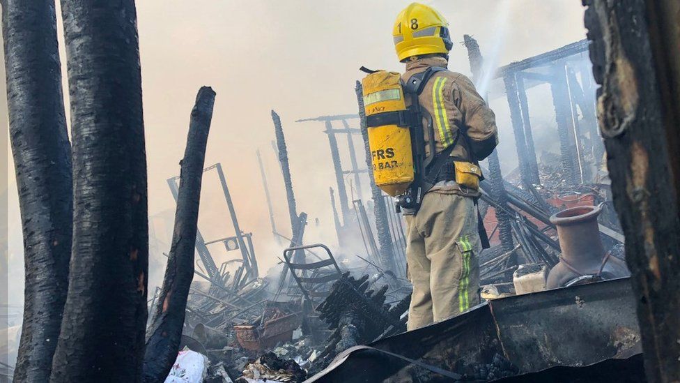 Christchurch house fire: Residents allowed home - BBC News