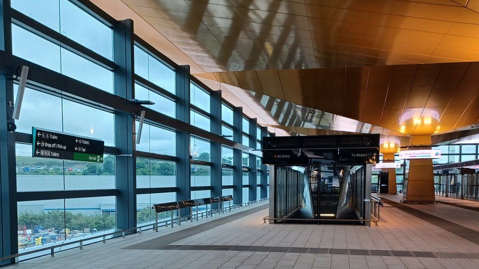 King Charles III boards delayed Luton DART airport shuttle - BBC News