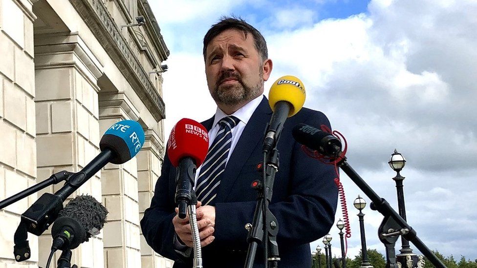 Robin Swann: Man arrested after threats to health minster - BBC News