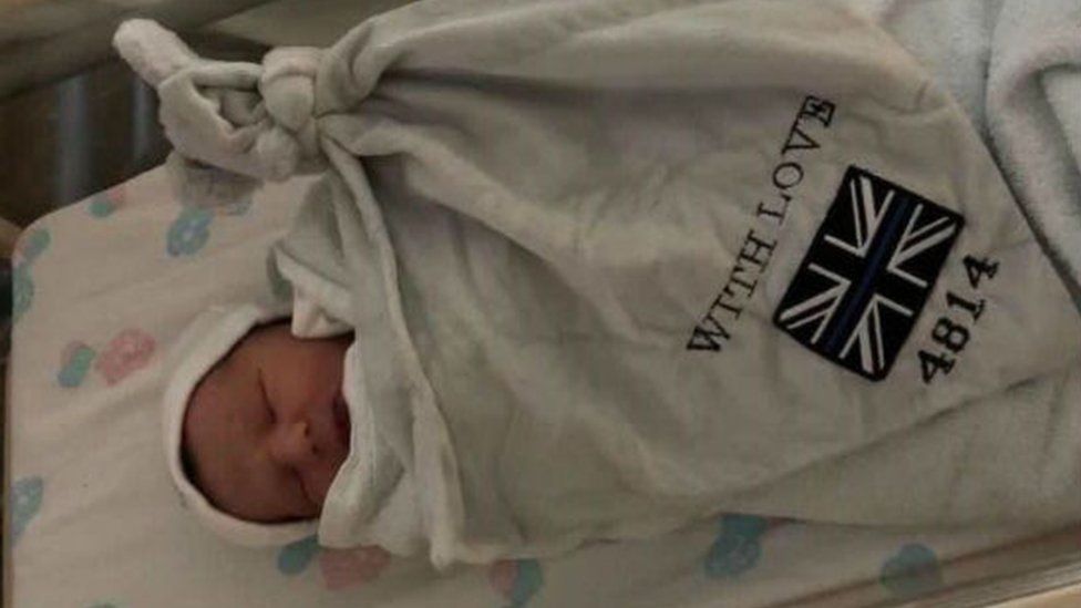 PC James Dixon: Baby son named after Road Wars dad - BBC News