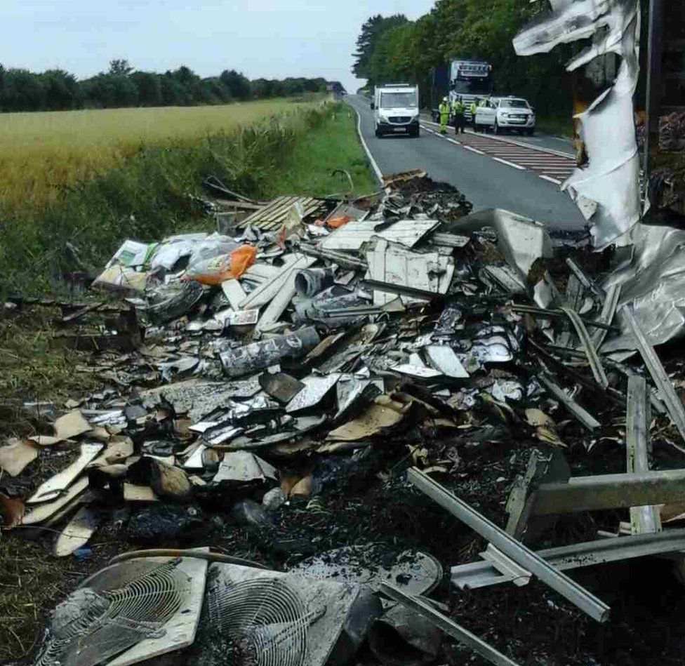 A303 lorry blaze leaves nails embedded in road surface - BBC News