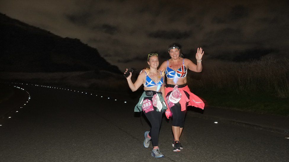 Colourful bras light up Edinburgh for Scotland MoonWalk - BBC News