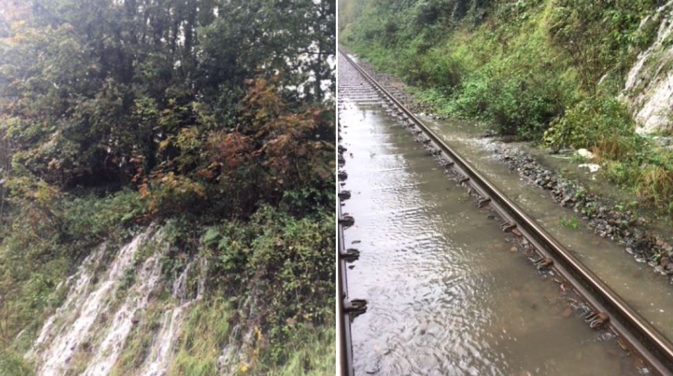 Flooded tracks cause rail travel disruption - BBC News
