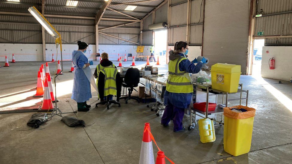 Covid: A day in the life of a coronavirus test centre worker - BBC News