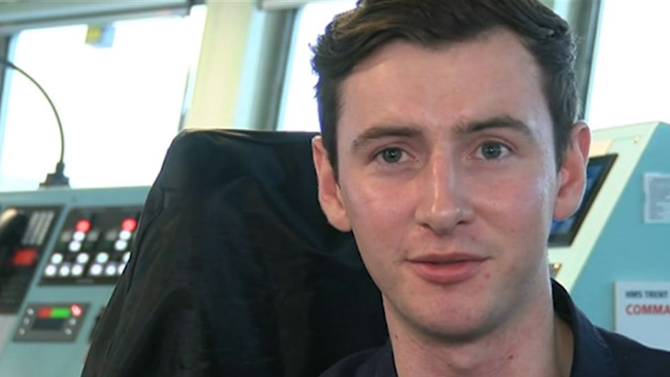 Navy sailors honoured for rescue from burning ship - BBC News