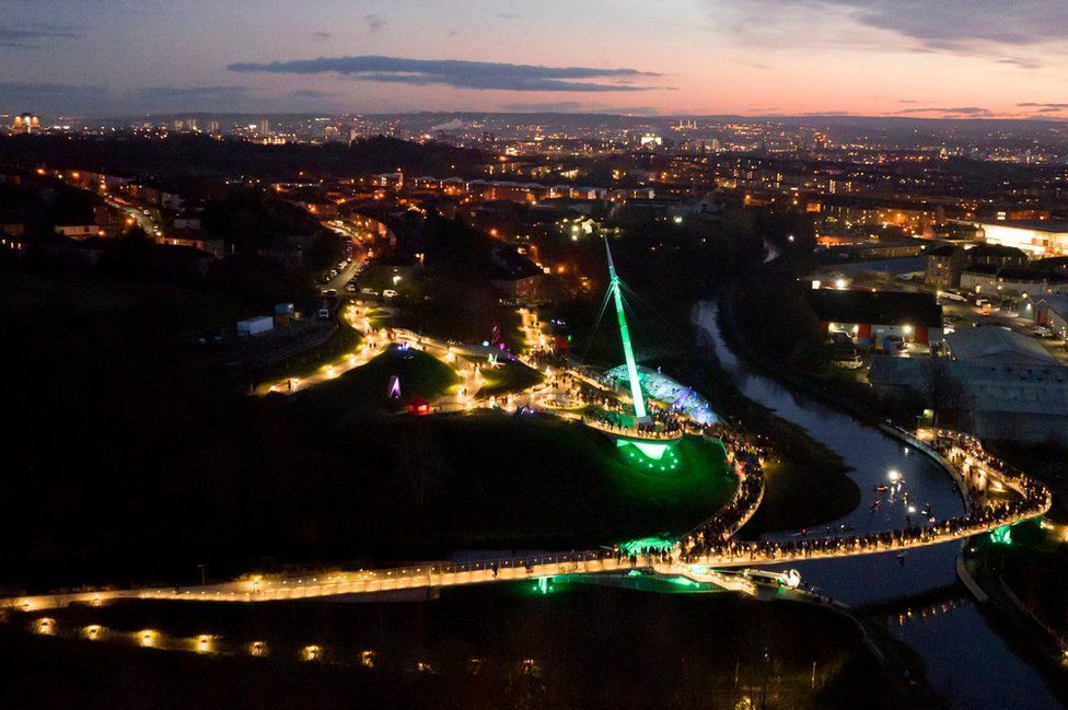 Pedestrian bridge opens with a celebration of light - BBC News