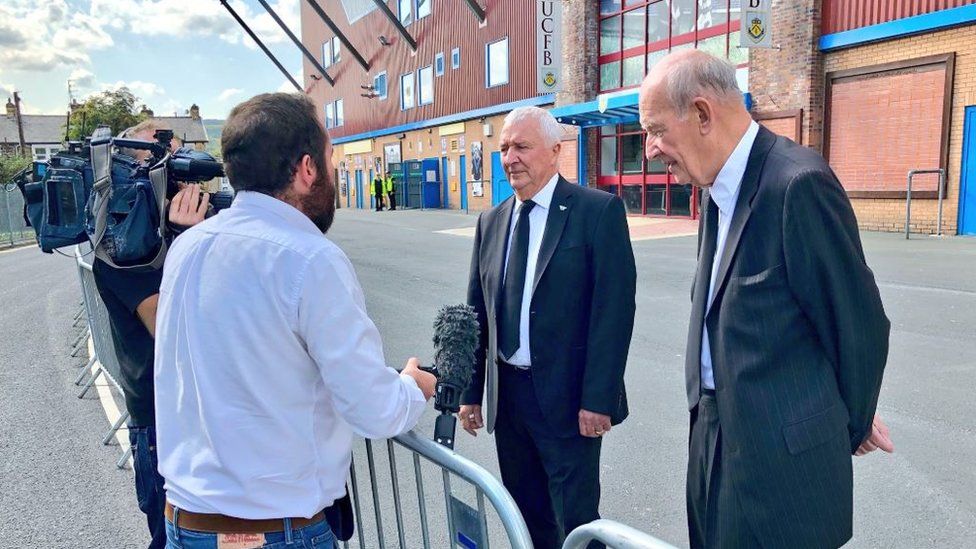 Burnley fans gather for funeral of 'greatest ever' player - BBC News