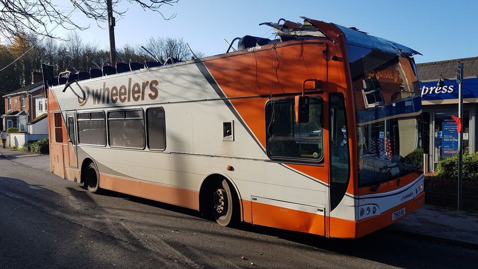 Andover crash: Bus driver fined after roof torn off in bridge strike - BBC News