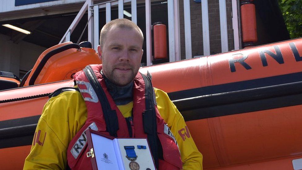 New Brighton lifeboat volunteer gets gallantry award for sea rescue ...