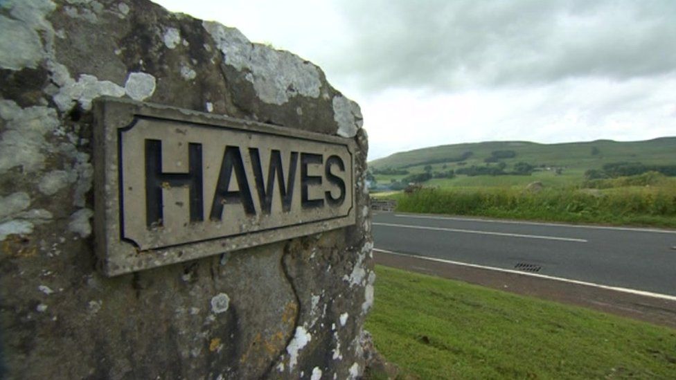 Hawes community group takes over petrol station - BBC News