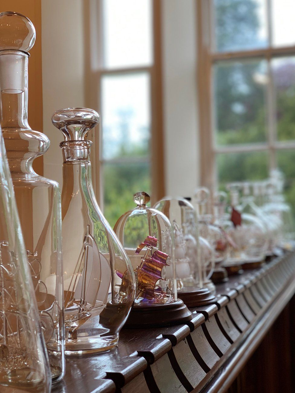 Northumberland exhibition shows 150 glass ships in bottles - BBC News