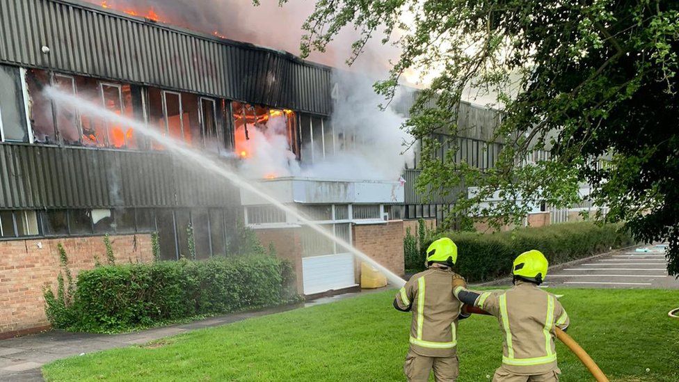 Redditch factory destroyed in fire involving propane cylinders - BBC News