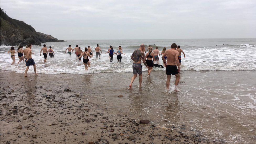 Wild swimming: Swansea man's cold sea challenge 'to get out of bed ...