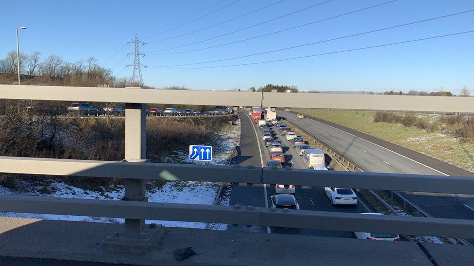 M77 reopens after crash involving eight vehicles - BBC News