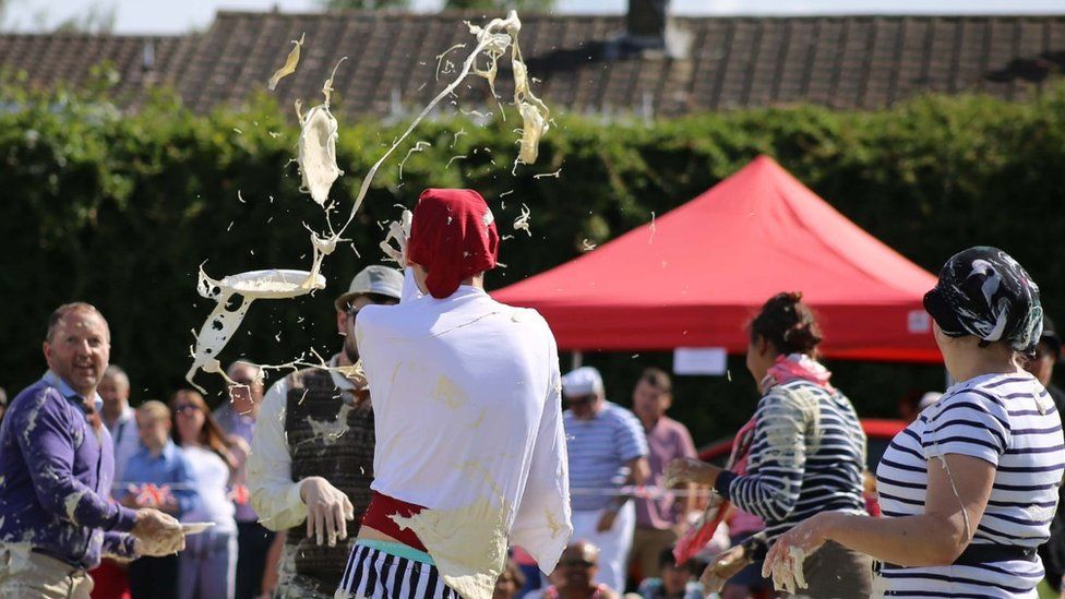 Teams compete for World Custard Pie Championship trophy - BBC News
