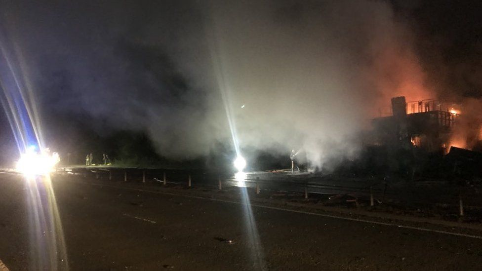 Lorry wrecked in fire on Highland road - BBC News