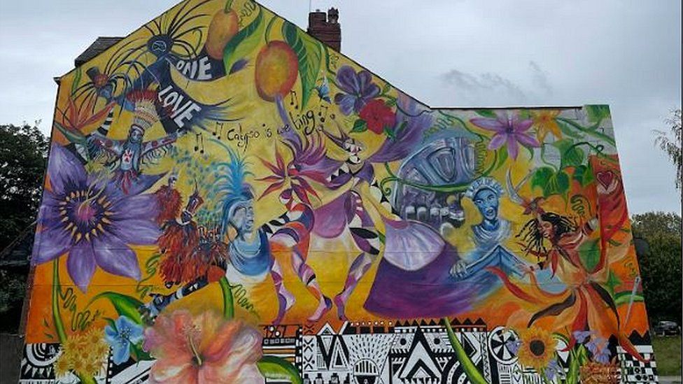 Leeds: Giant mural celebrates West Indian Carnival - BBC News
