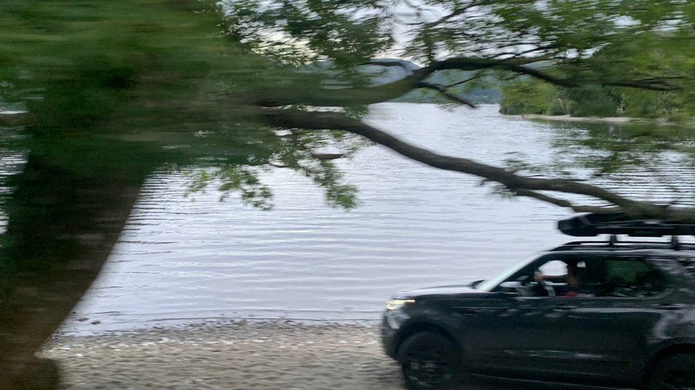 Police probe after cars driven along Ullswater lakeside - BBC News