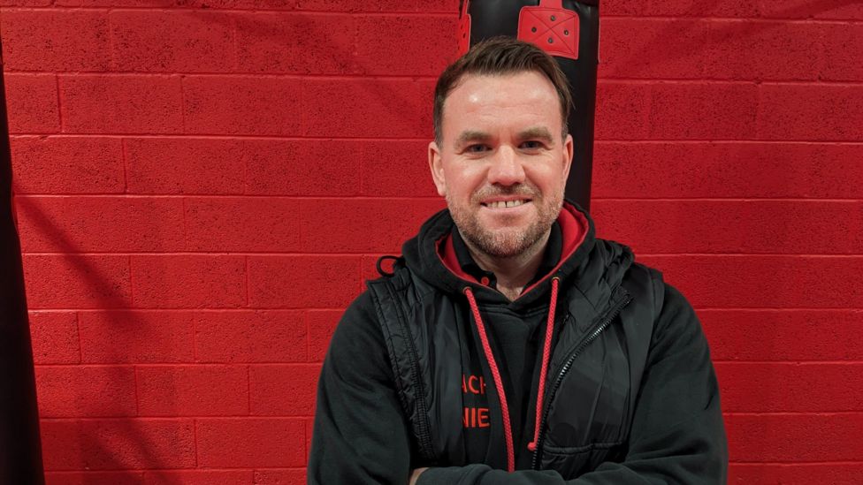 Boxing club transforms life for autistic boy - BBC News