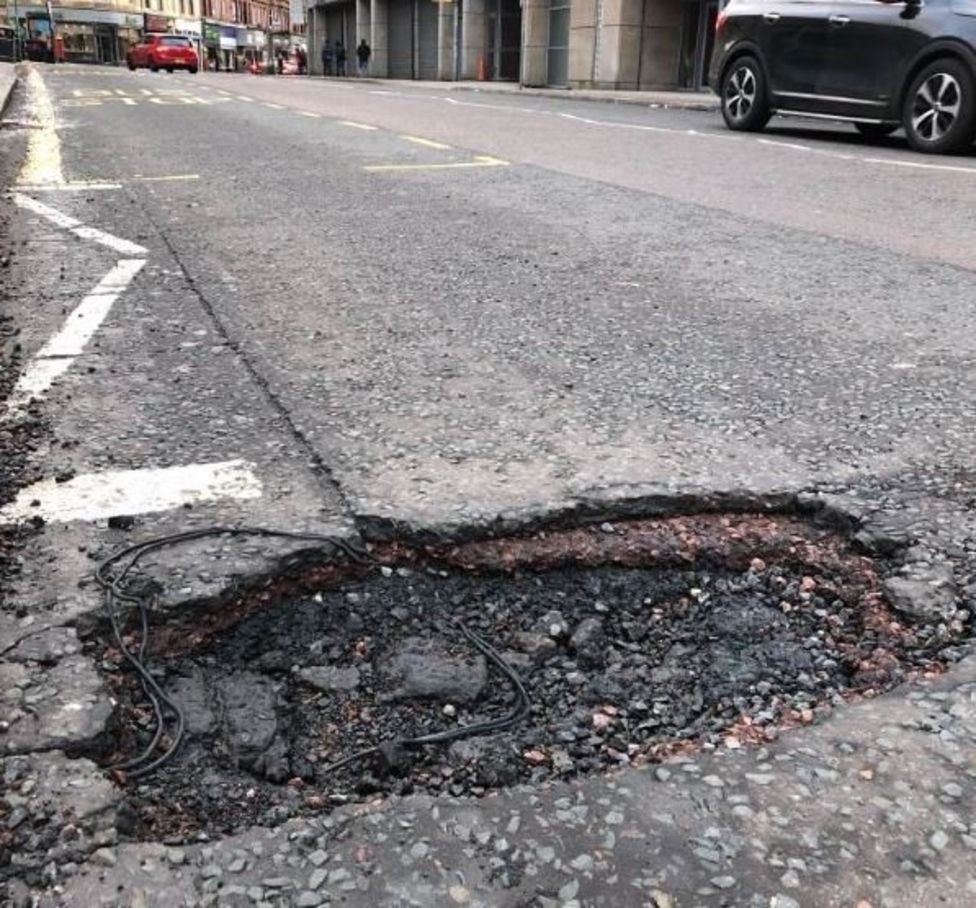 Pothole photos: Your pictures of crumbling roads - BBC News