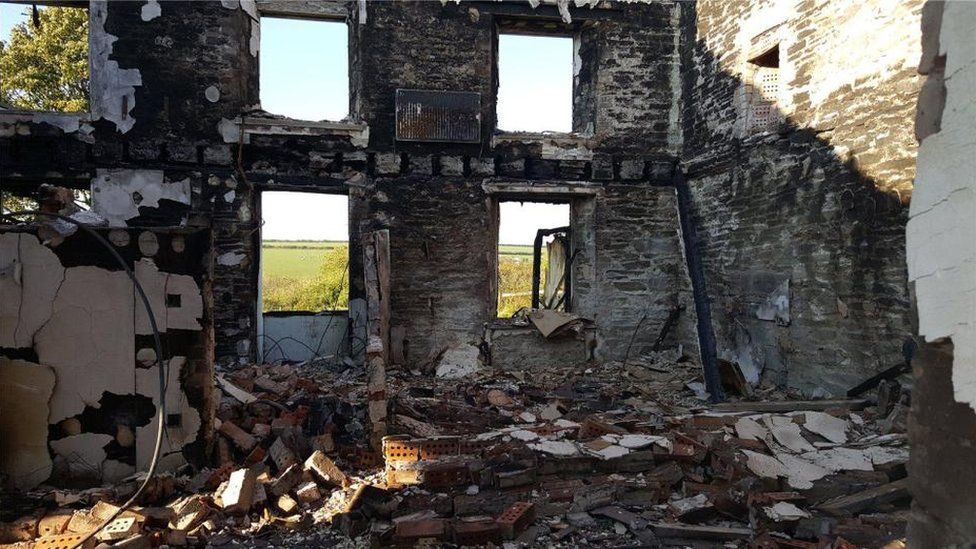 Man who burned down Whitland farmhouse jailed for five years - BBC News