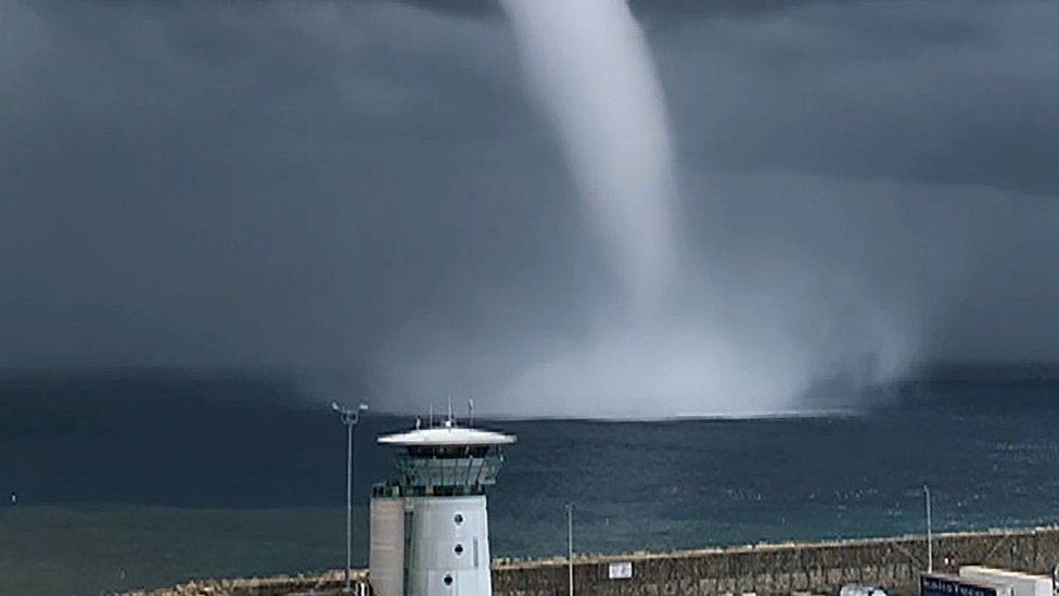 Rare sighting of a waterspout in County Kerry - BBC News