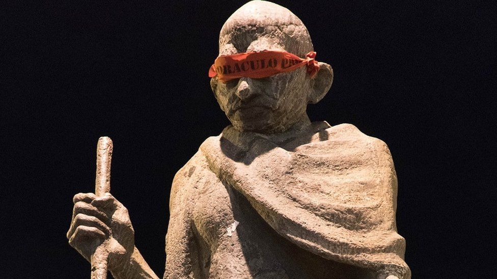 Brazil Artist Blindfolds Rio Statues As Protest Bbc News
