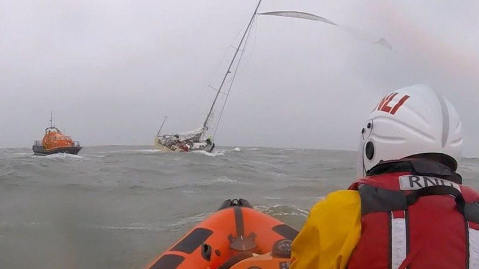 Sailor rescued from 'unforgiving' seas near Hartland - BBC News
