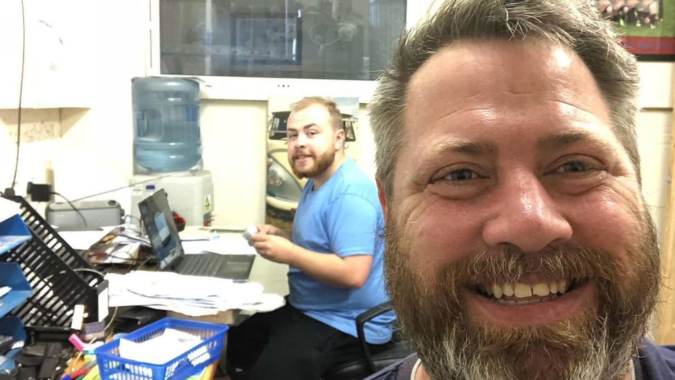 Man fundraising to buy dad a bionic arm - BBC News