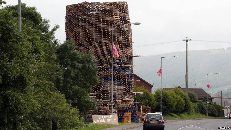 Bonfire towers near Carrickfergus petrol station - BBC News