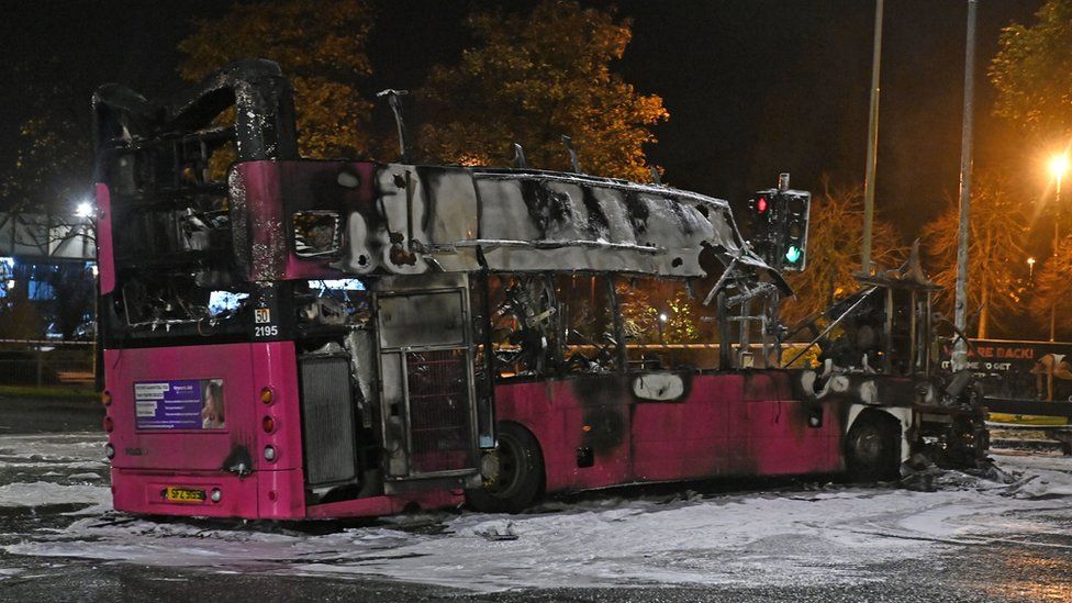 Newtownabbey: Bus hijacked and set on fire by gang - BBC News