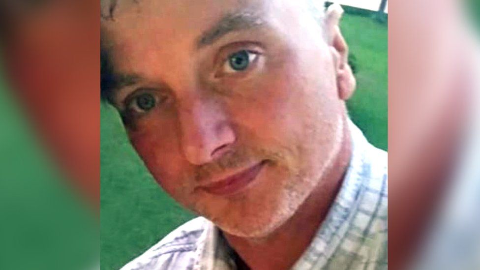 Woodmancote murder probe: Family of four found dead in house are named - BBC News