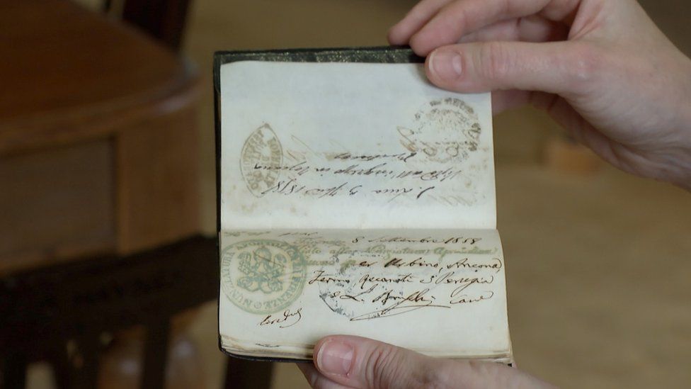 'Incredible' discovery of old passport in Devon school chest - BBC News