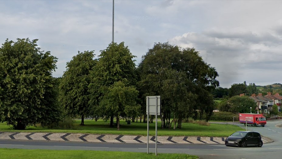 Woman dies in overturned car on Middleton roundabout - BBC News