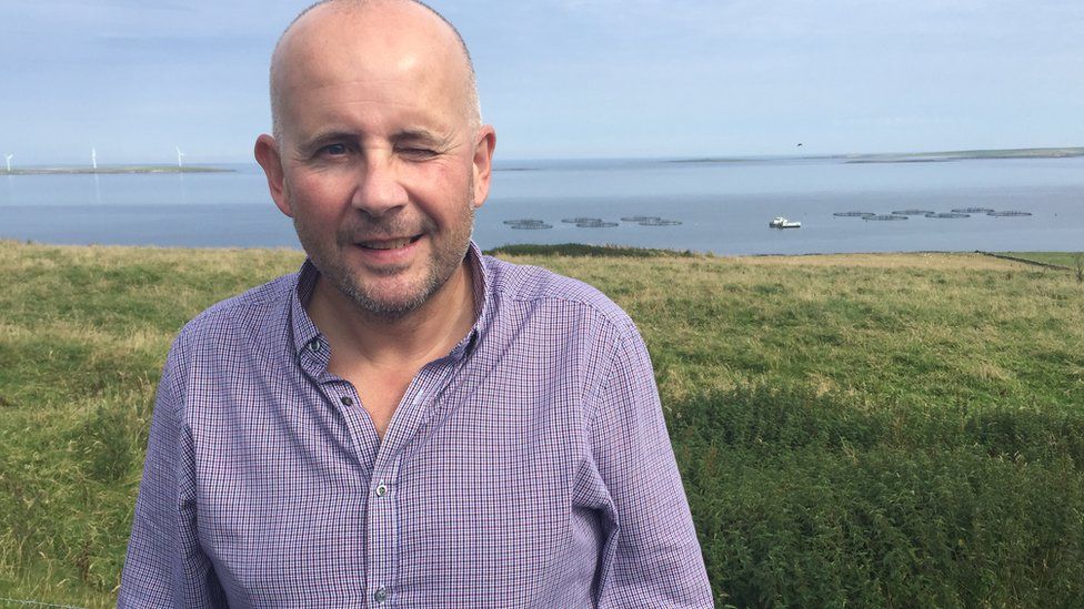 Orkney salmon farm plans eco homes to keep workers - BBC News