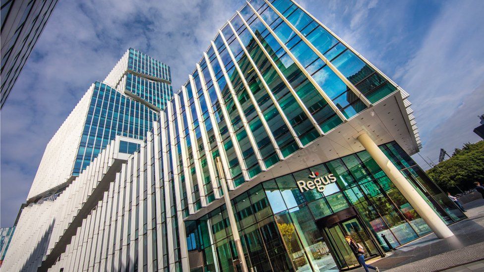 Office provider IWG shares surge on bid approaches - BBC News