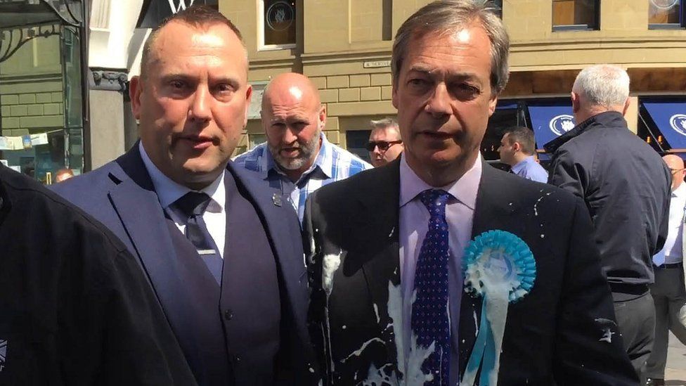 Nigel Farage hit by milkshake during Newcastle walkabout - BBC News