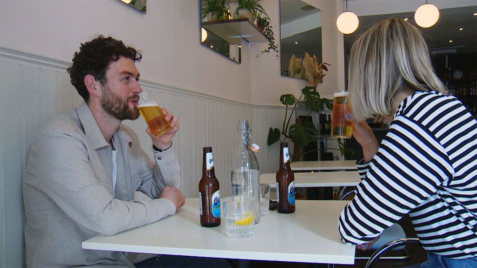 Covid in Scotland: Restriction levels ease for millions of Scots - BBC News