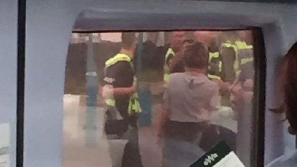 Two men arrested in Port Talbot after fight on train - BBC News