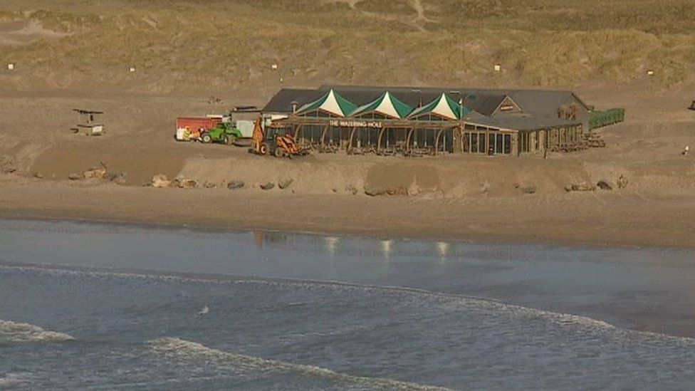 The Watering Hole building expansion work starts - BBC News